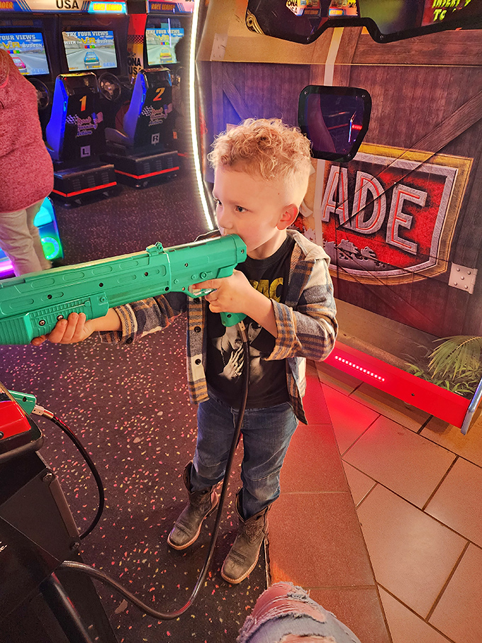 Start 'em young! This little sharpshooter's got better aim than a caffeinated cupid on Valentine's Day.
