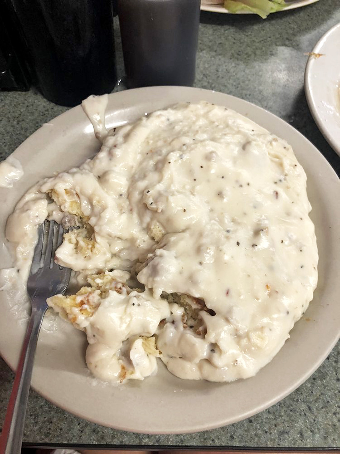 Biscuits and gravy: Southern comfort on a plate. These fluffy clouds of carbs swim in a sea of peppery perfection.
