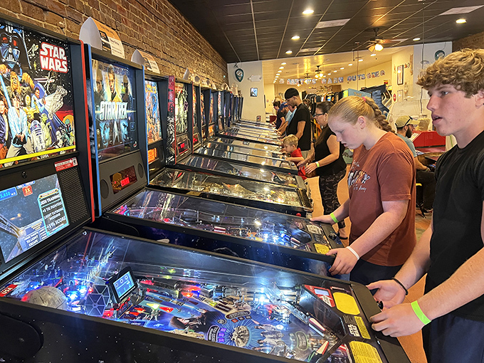 Brick walls, neon lights, and the sweet sound of victory. This gaming haven is where retro cool meets modern-day excitement.