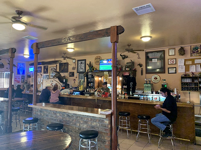 At this bar, every hour is happy hour. Just don't challenge anyone to a quick draw contest!