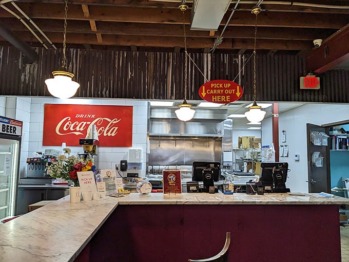 The gateway to gastronomic bliss! This counter has seen more eager faces than a Justin Bieber concert, but with less screaming and more finger-licking.