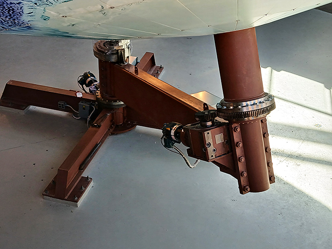 The wizard behind the curtain! Eartha's mechanical system is a Rube Goldberg-esque marvel keeping our mini-planet in motion.