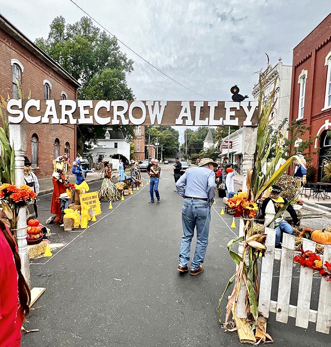 Scarecrow Alley: Where fall fun comes to life! It's like Halloween and Thanksgiving had a party, and everyone's invited.