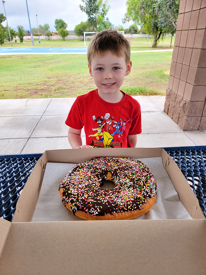 Size doesn't matter when it comes to joy. This giant donut could make even the Jolly Green Giant giggle with glee.