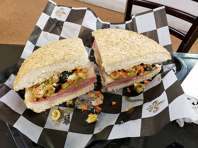 The Big Easy's answer to the Italian sub. This muffuletta is stacked higher than a jazz musician's record collection!