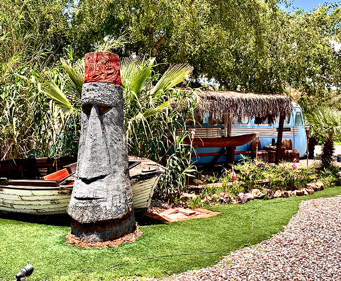 Who says the desert can't have a little tropical flair? This tiki statue stands guard over a slice of Polynesian paradise, proving that Gilligan's Island and Route 66 can coexist.