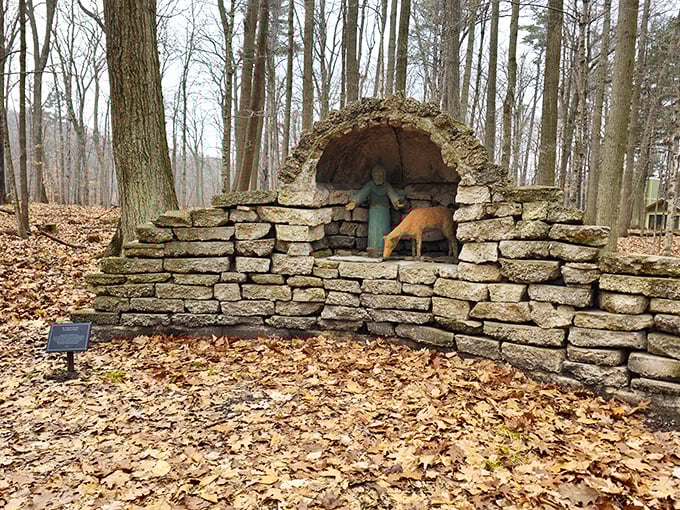 Holy hideaway, Batman! This stone grotto looks like the perfect spot for a superhero's secret lair or a really fancy garden shed.