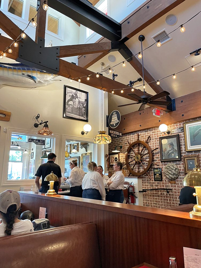 The crew that keeps this ship sailing smoothly. These staff members are the unsung heroes of your seafood saga.