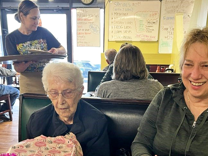 The breakfast dream team in action! These folks could probably flip pancakes in their sleep (but let's hope they don't).