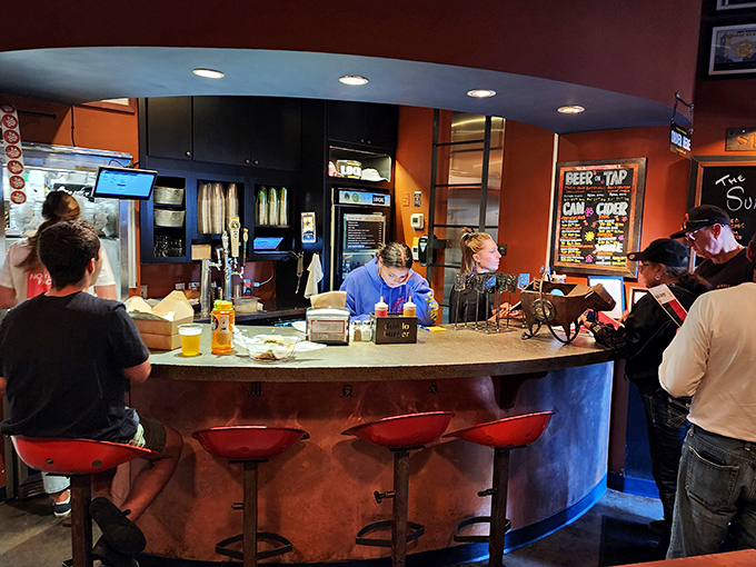 The burger maestros at work! Watch as these culinary artists craft each patty with the care and precision of a Swiss watchmaker.