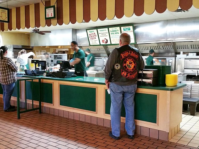Where the magic happens! Marion's staff, the unsung heroes of your pizza night, are ready to make your cheesy dreams come true.