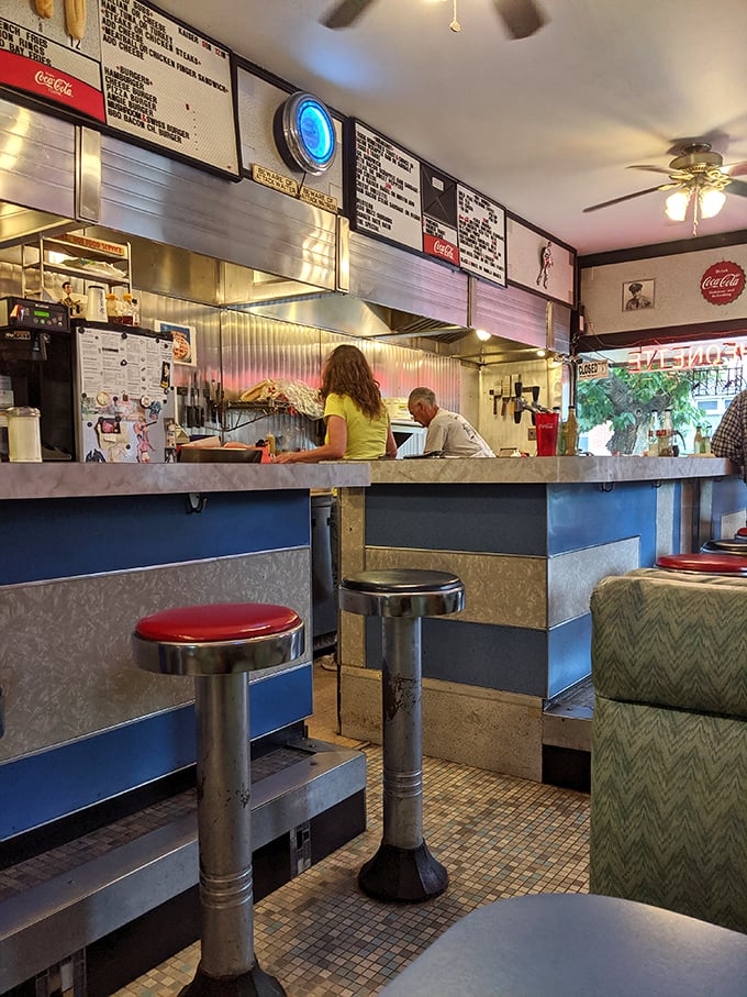 The heart of Angelo's beats behind the counter, where culinary magic happens faster than you can say "over easy."