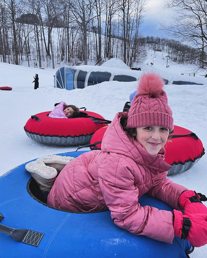 Tubing fun for all ages: Proving that you're never too old to enjoy sliding down a hill on an inflatable donut. Wheee!