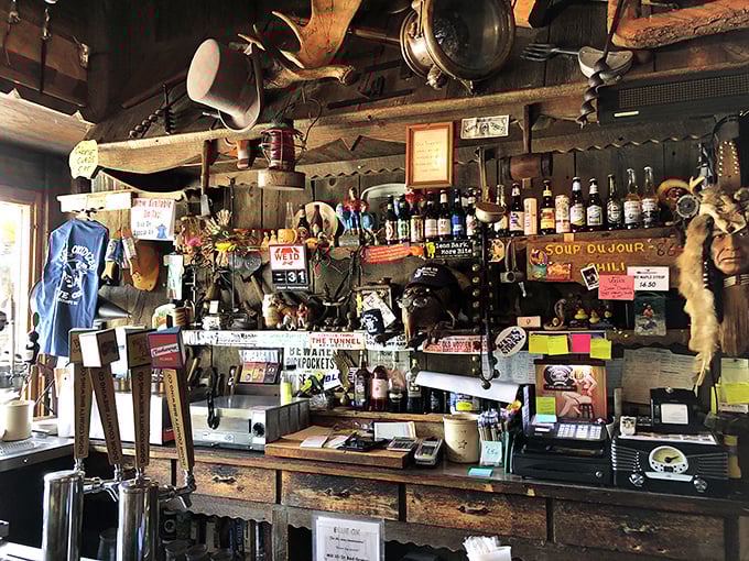 This isn't just a bar, it's a museum of merriment! From vintage signs to quirky knick-knacks, every inch tells a story (some taller than others).