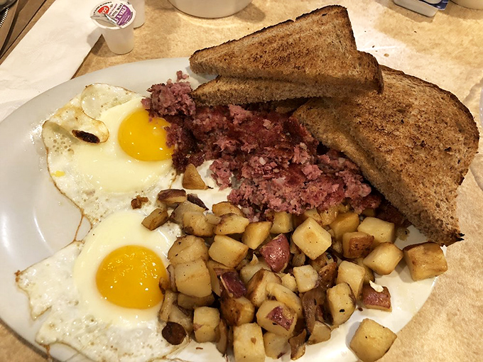 Breakfast of champions? More like breakfast of food coma-inducing bliss. This plate is the stuff of hangover dreams.