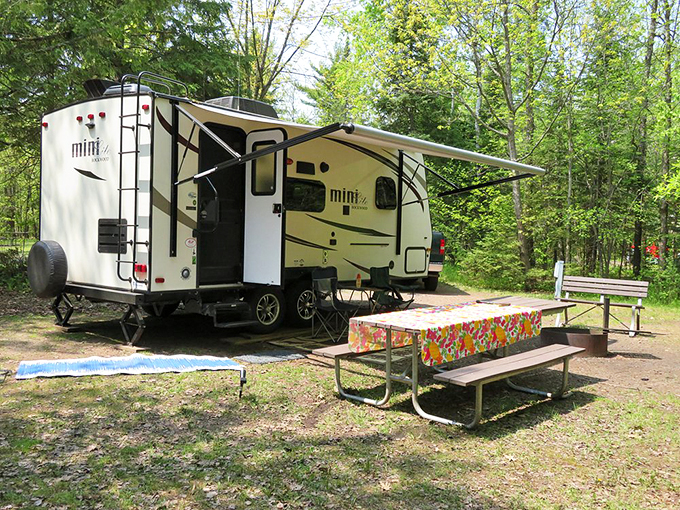 Glamping, anyone? This cozy setup proves you can have your cake and eat it in the great outdoors too.