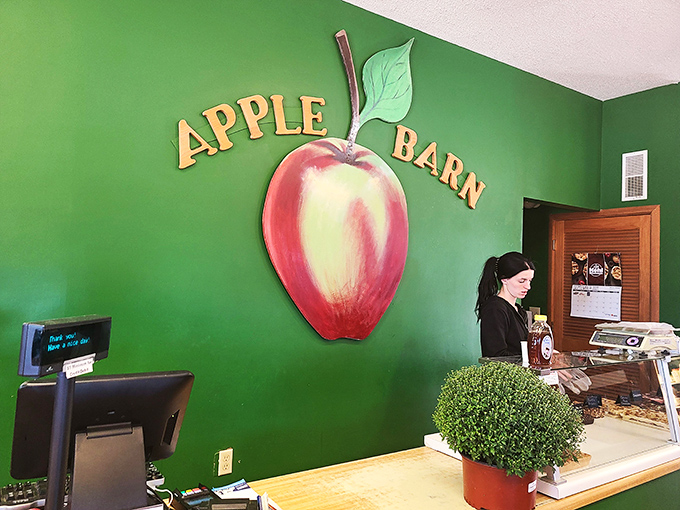 The green wall of temptation! This cheerful counter is where apple dreams come true and wallets willingly surrender.