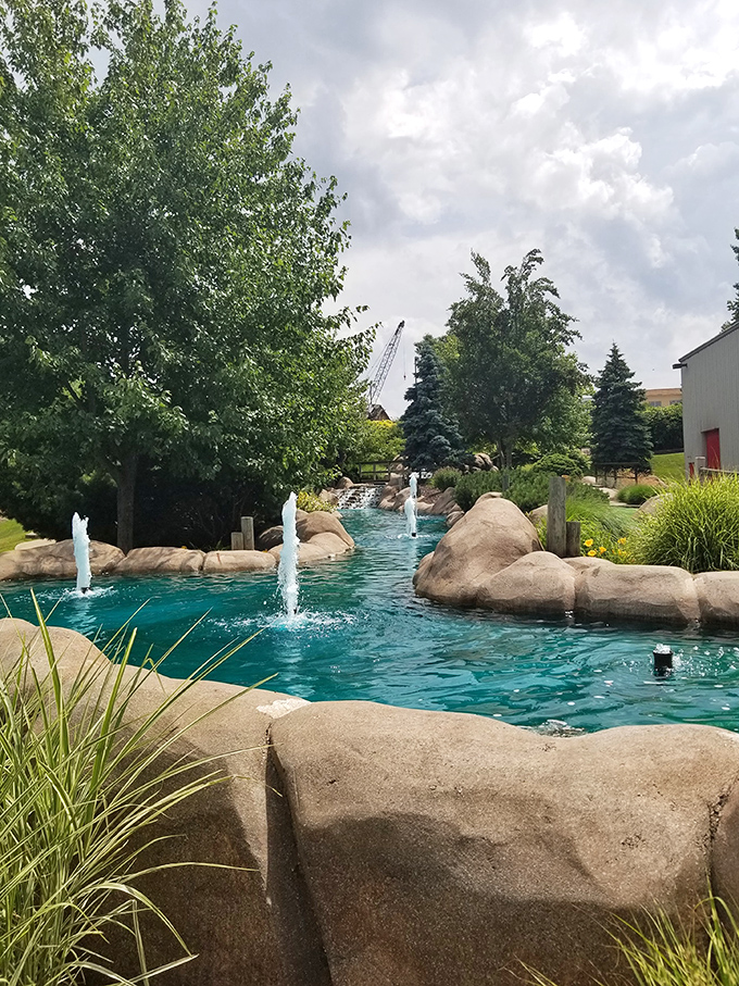 Oasis of tranquility or sneaky splash zone? This fountain adds a touch of zen to the amusement park chaos. Just don't blame us if you get caught in the crossfire!