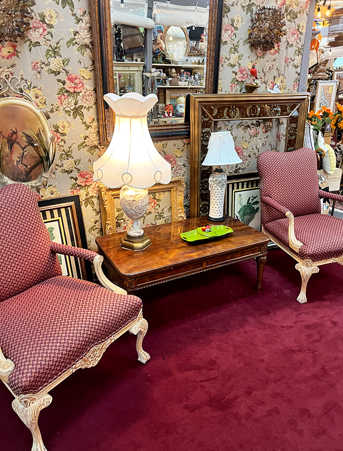 Time-travel in a single booth! This vintage furniture setup is like your grandma's living room met a Mad Men set and decided to redecorate.