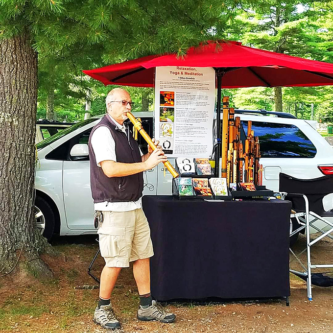 Tune in to tranquility! This vendor's soothing flute melodies are like a spa day for your ears amidst the market hustle.