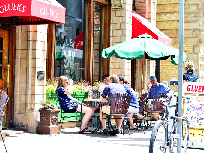 Al fresco dining with a side of people-watching. Gluek's patio: where Minneapolis meets Munich on a sunny afternoon.