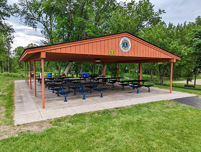 This picnic shelter is the Swiss Army knife of outdoor gathering spots - ready for everything from family reunions to impromptu jam sessions.