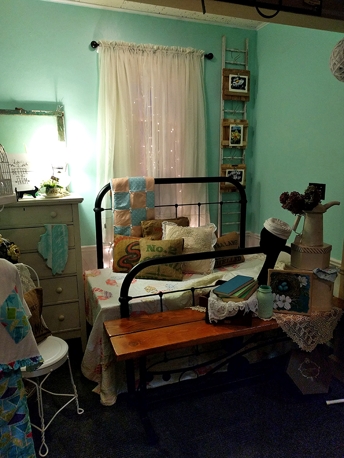 Nap time never looked so stylish! This cozy bedroom setup is like stepping into a vintage dream, complete with twinkling lights and enough pillows to build a fort.