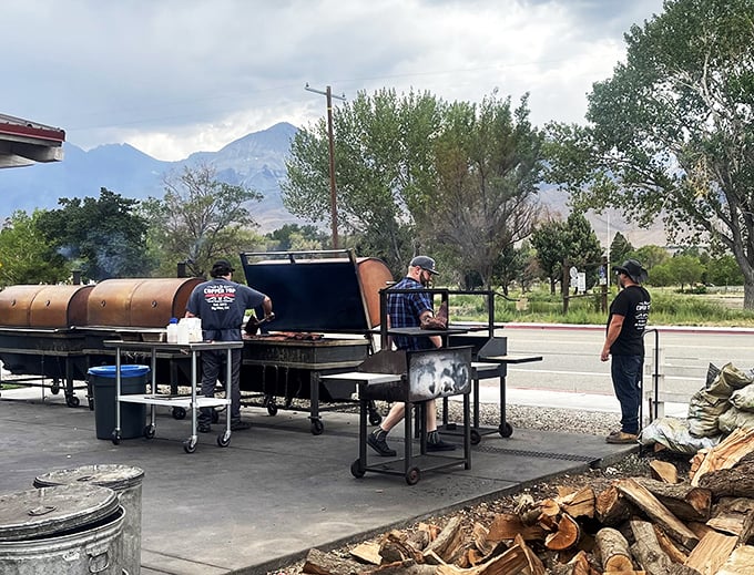 Masters of the pit at work! These folks are the unsung heroes behind your barbecue bliss.