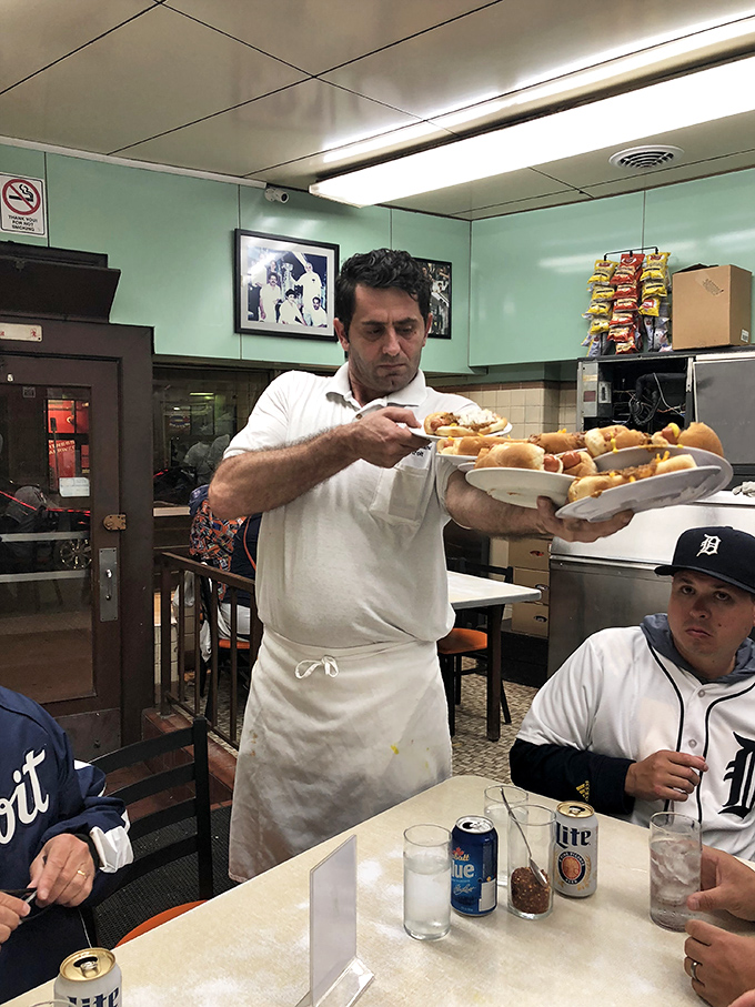 The unsung hero of hot dog heaven. Watch in awe as this culinary conductor orchestrates a symphony of coney perfection.