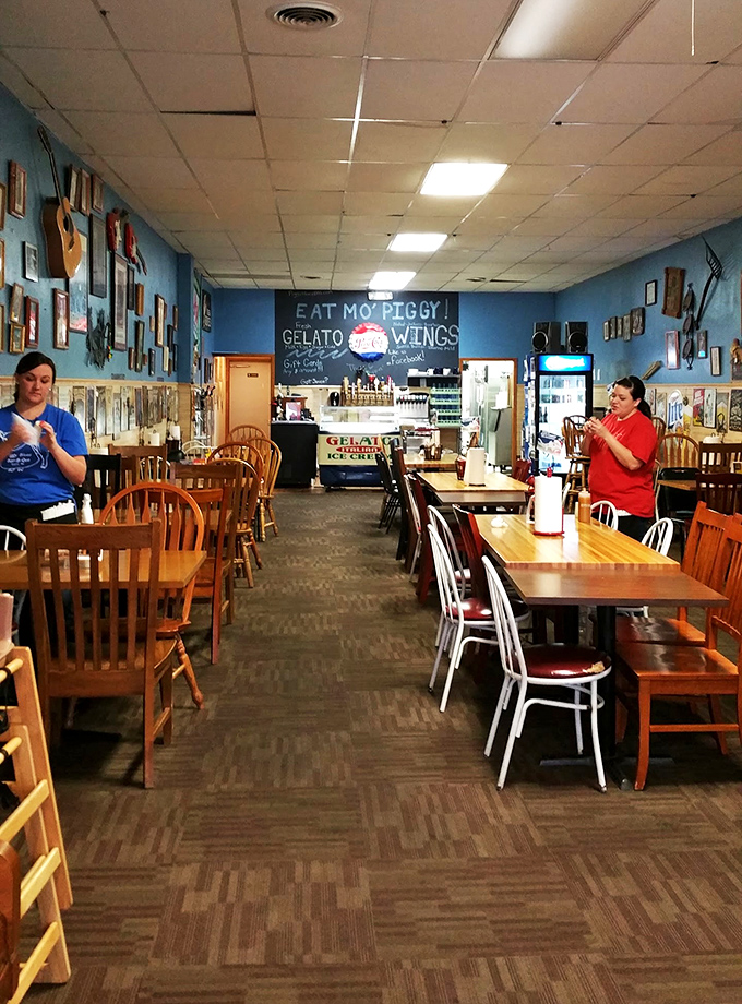 Where the magic happens: a glimpse into the heart of Piggy Blue's. These folks aren't just staff; they're the custodians of carnivorous dreams.