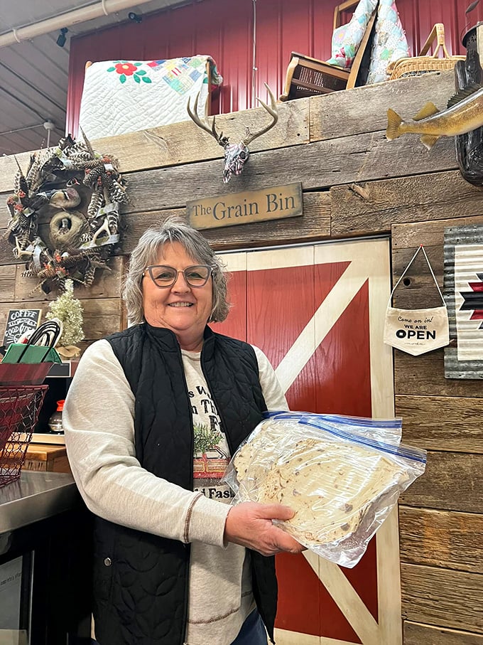 The image shows the interior of the store with various products on display.