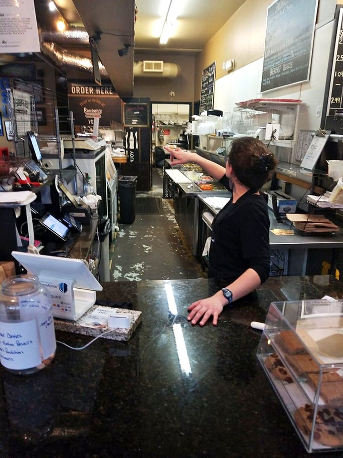 Sandwich artists at work! Watch as they transform simple ingredients into edible masterpieces faster than you can say "extra pickles."