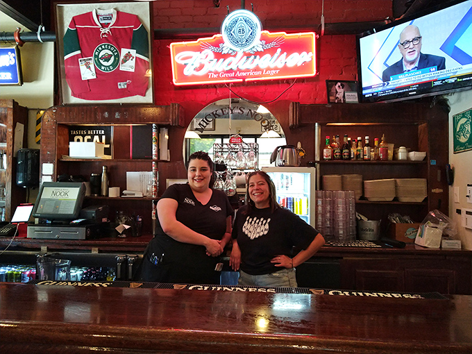 The unsung heroes of burger bliss! These friendly faces are the wizards behind the Nook's mouthwatering magic.