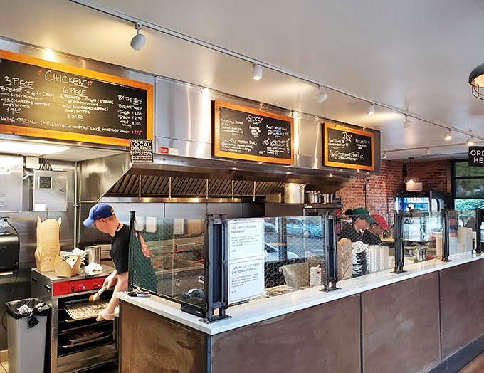 Behind the scenes of deliciousness! These kitchen maestros are working their crispy, juicy magic &ndash; it's like watching the Food Network, but you get to eat the results!