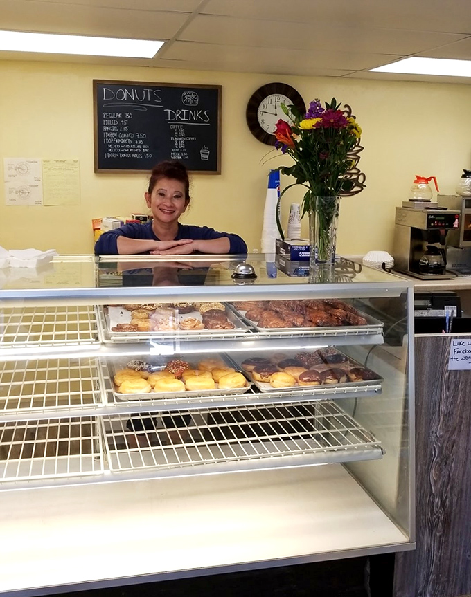 The smile behind the sprinkles! Meet the friendly face that makes your mornings brighter, one donut at a time.