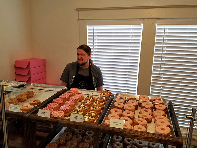 Behind every great donut is a great baker. This friendly face is the wizard behind the curtain, conjuring up sweet magic one batch at a time.