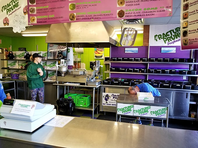 The wizards behind the curtain! These donut artisans are creating edible magic before our very eyes.