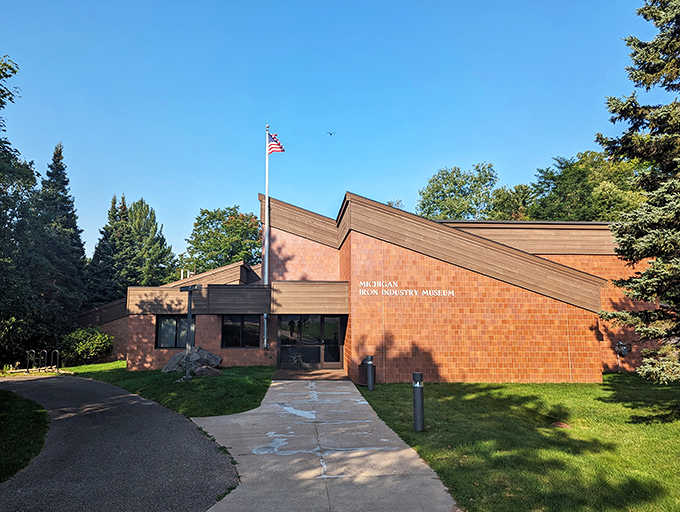 Strike while the iron is hot! The Michigan Iron Industry Museum is a rustic reminder of the state's industrial roots, nestled in nature's embrace.