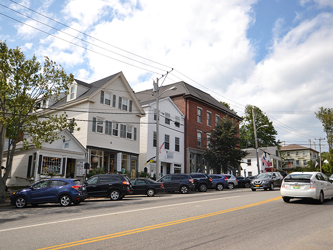 Wiscasset's Main Street: Where 18th-century charm meets 21st-century appetites. The architecture is as delightful as the famous lobster rolls.