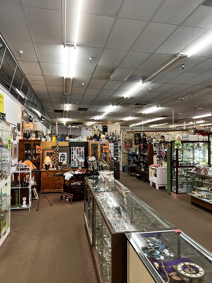 That red sign is like a beacon of retro goodness. Main Street Antique Mall: where time stands still, but your wallet might not!
