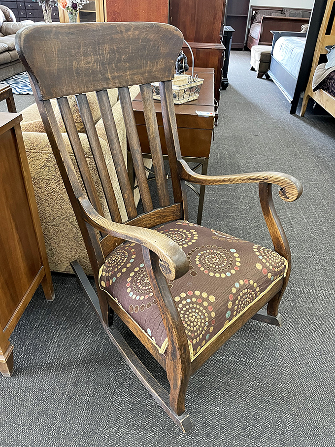 This rocking chair has seen some stories. It's like sitting in the lap of history, but more comfortable.