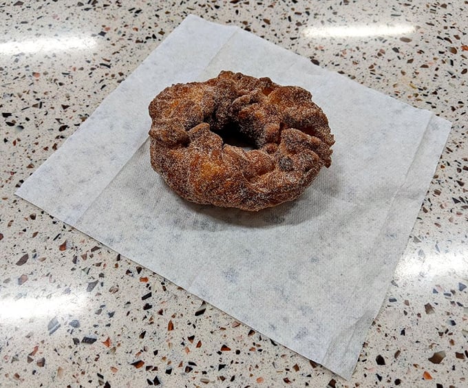 Fall in a bite! This spiced funnel donut looks like it could warm you up faster than a pumpkin spice latte.