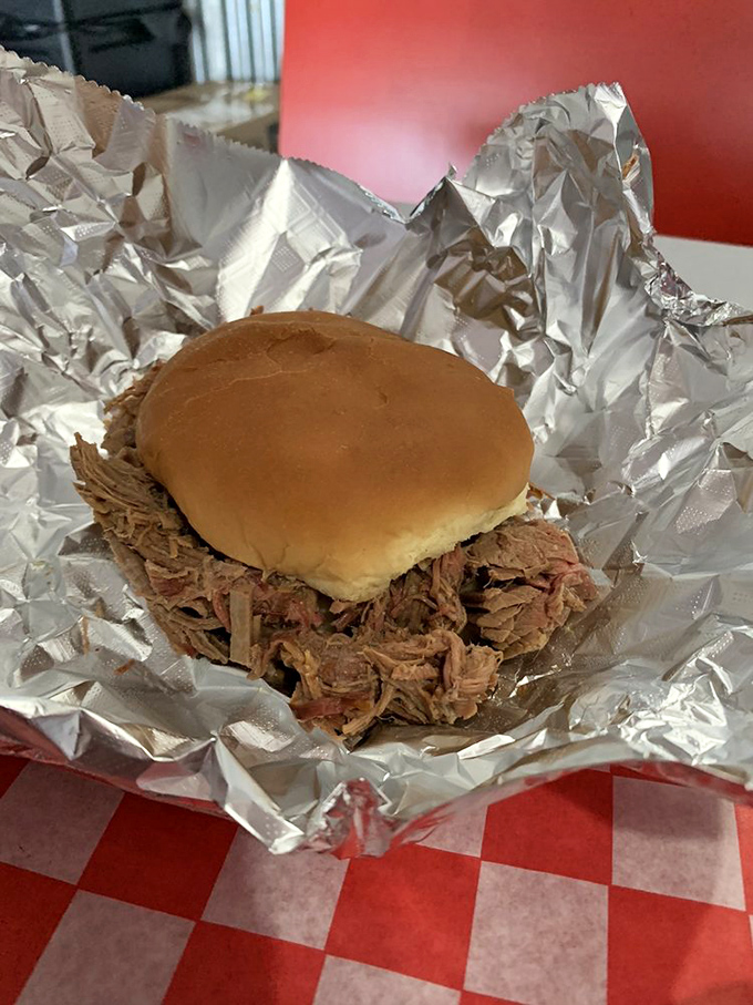 The brisket sandwich: A tower of smoky perfection that'll make you wonder why you ever ate anything else.