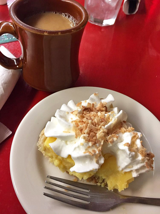 Coconut cream pie that's fluffier than a cloud and sweeter than your grandma's cheek pinch. A slice of heaven, Maine-style.