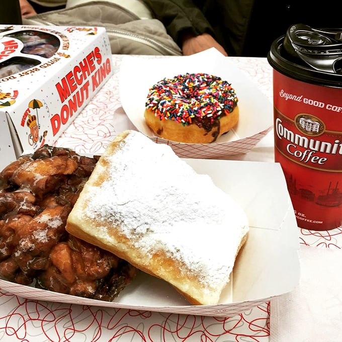 The holy trinity of morning bliss! Coffee, donuts, and more donuts &ndash; because one is never enough in this sugar-coated kingdom.