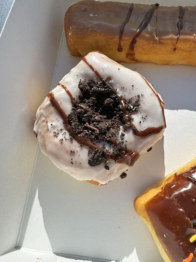 Cookies 'n Cream donut: because sometimes you can't decide between cookies and donuts. It's the Switzerland of sweet treats!