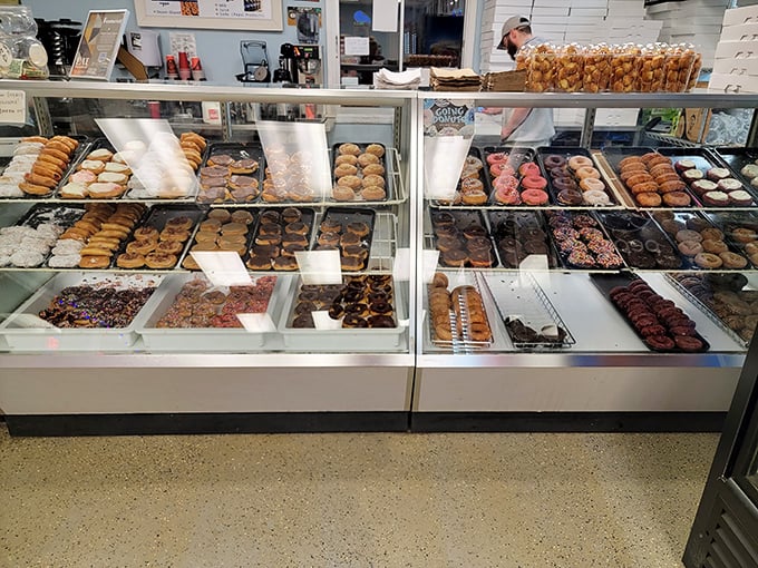 A glass case of emotion... and donuts. It's like Willy Wonka opened a jewelry store, but everything's edible and calorie-laden.