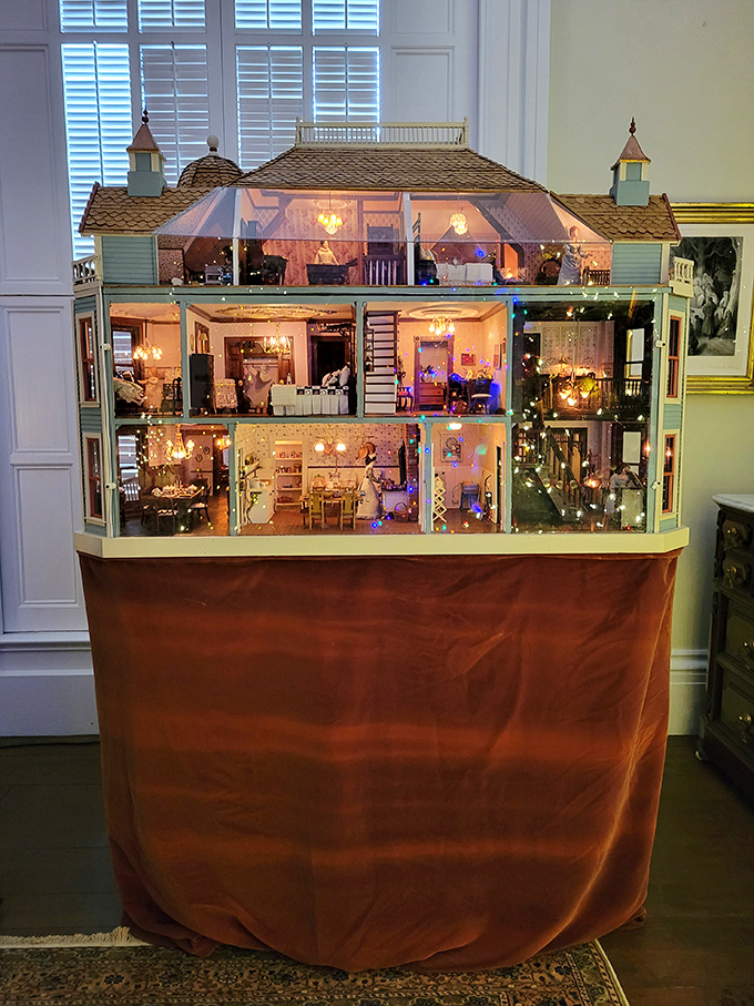 Honey, I shrunk the mansion! This dollhouse is so detailed, you half expect tiny Victorian ghosts to start rattling even tinier chains.