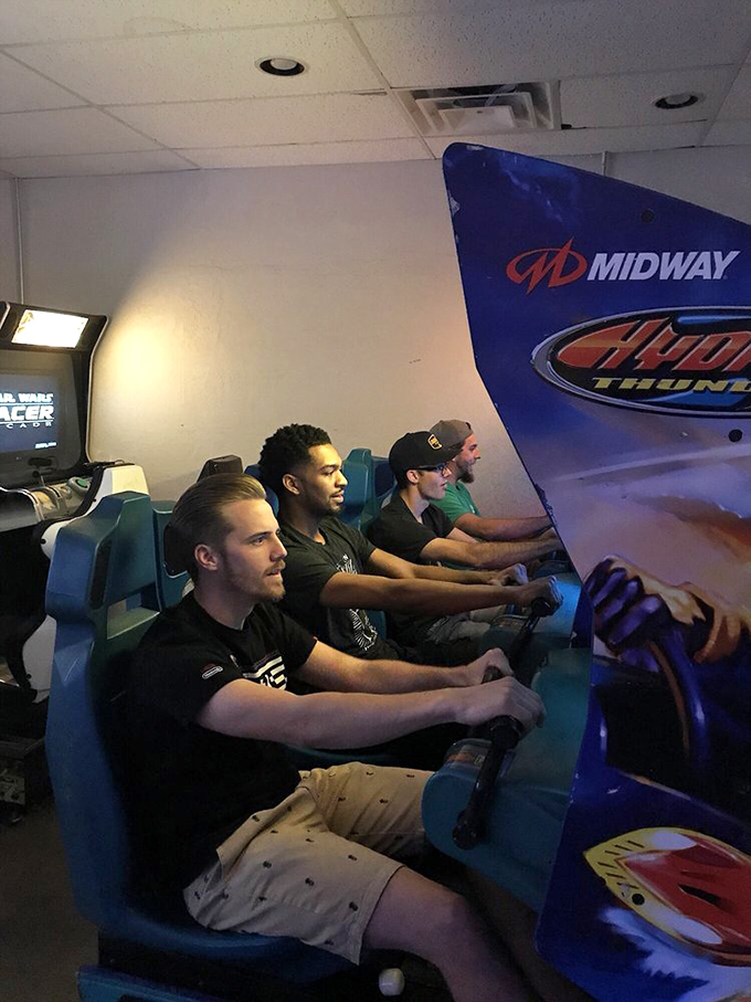 Four friends, one screen, and enough competitive spirit to power a small city. This is what peak "friendly" rivalry looks like, folks.