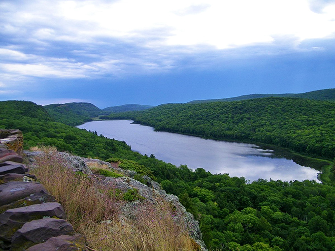 Mirror, mirror on the lake, which is the fairest view to take? This serene scene is more relaxing than a thousand meditation apps combined.
